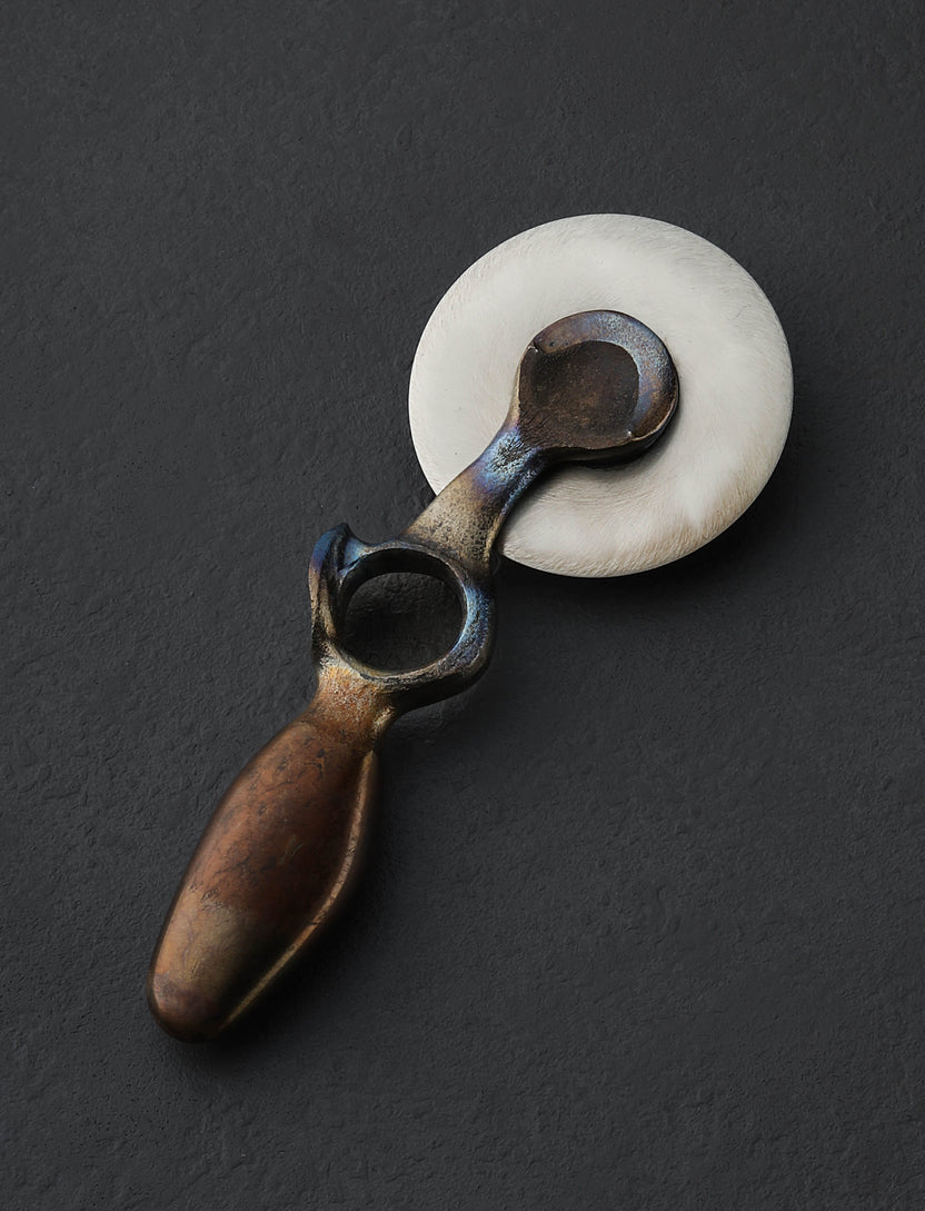 Forged Titanium Pizza Cutter | Eatingtools